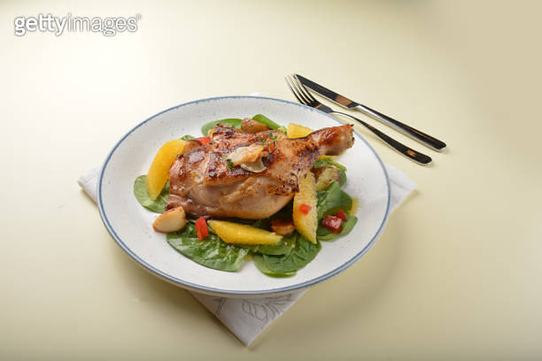 Texas grilled bbq chicken leg confit with vegetables and chef brown ...