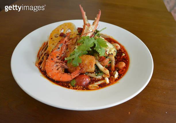 spicy mala Xiang guo laksa curry with seafood prawn, scallop, chicken ...