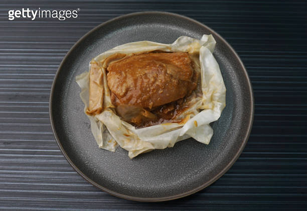 chinese baked handmade paper wrapped chicken meat with herbal dark soy ...