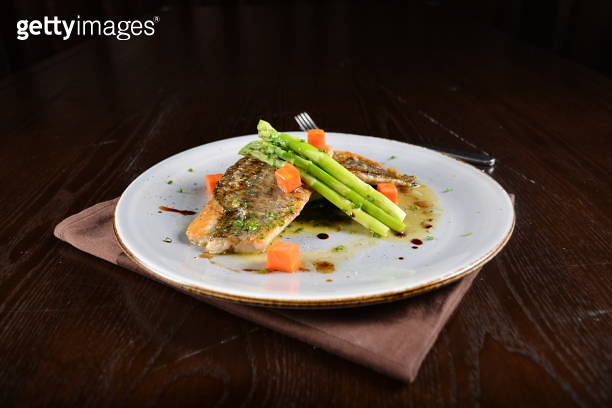 chef pan fried fresh grouper fish fillet seafood with asparagus and ...