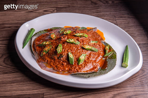 grilled bbq fresh whole seafood stingray fish with spicy samba chilli ...