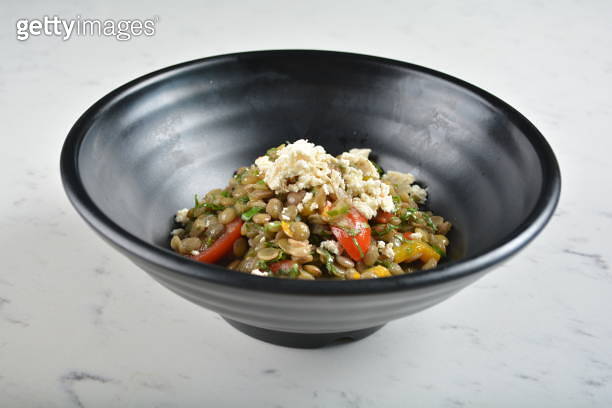 trio quinoa grain salad bowl with avocado, tomato, pea bean, carrot and ...
