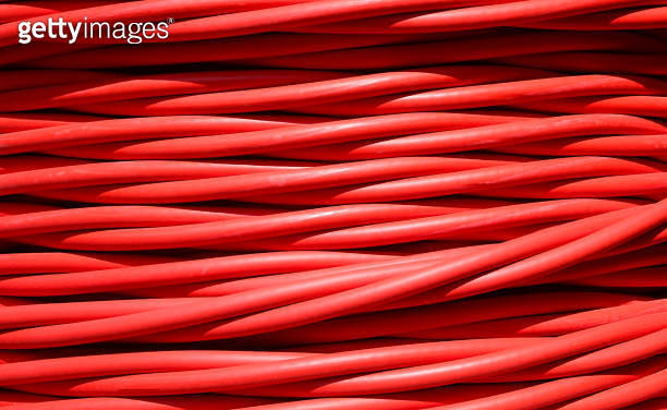red electrical cable for transporting high-voltage electricity from ...
