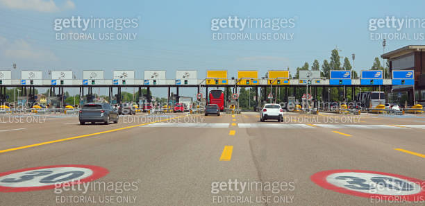 large motorway toll booth for toll collection with preferential lanes ...