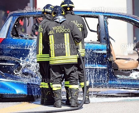 Italian firefighters in uniform put out the fire in the car 이미지 ...