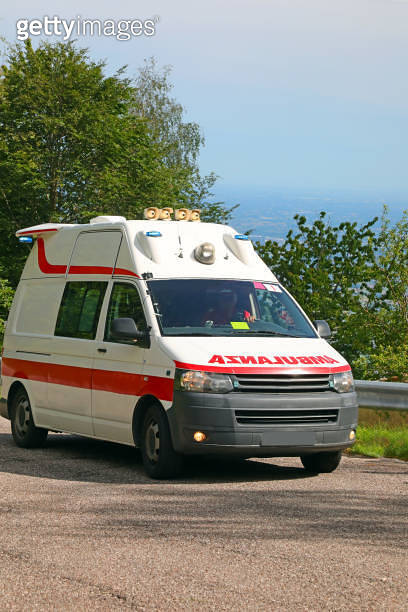 Ambulance van with the text AMBULANZA written backwards in Italian to ...