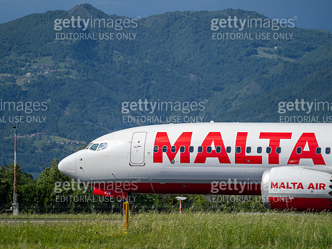 A Malta Air Boeing 737 Max 8 is taxiing to the runway at the Bergamo ...