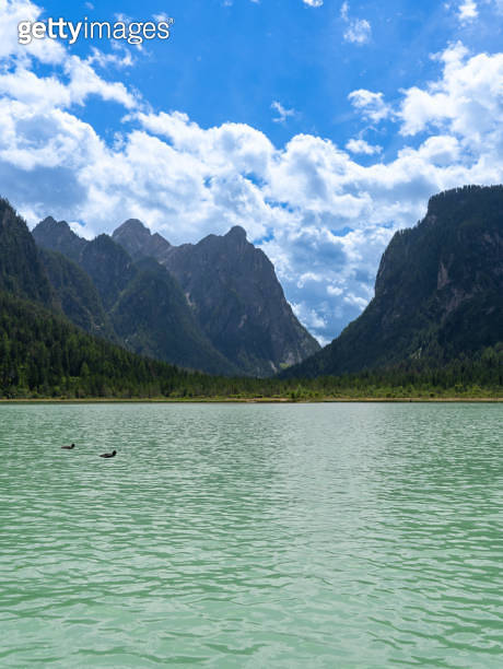 Amazing view of the famous Dobbiaco lake. Alpine lake. Italian Alps ...