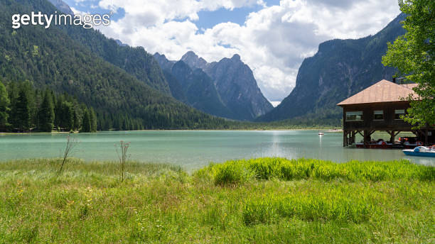 Amazing view of the famous Dobbiaco lake. Alpine lake. Italian Alps ...