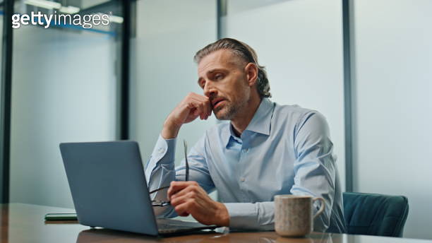 Worried ceo sitting workplace closeup. Stressed businessman getting bad ...