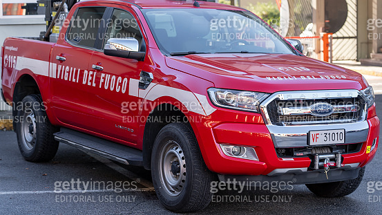 Red fire pick-up ready to provide first aid in case of emergency ...