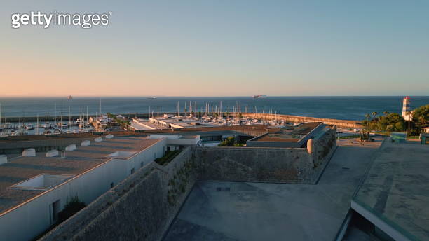 Drone view yachts harbour at evening ocean sunlight. Sailboats placed ...