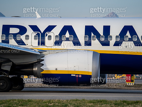 Ryanair Boeing 737 Max 8. Close-up to the engine of the passenger plane ...