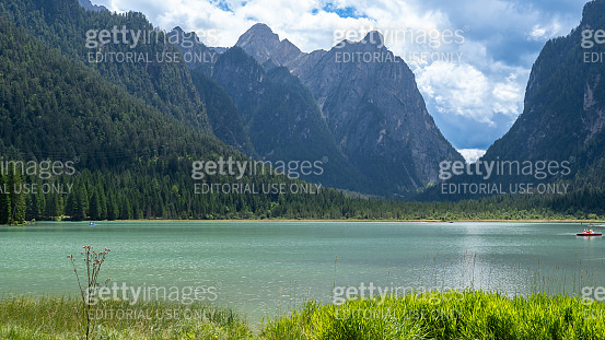 Amazing view of the famous Dobbiaco lake. Alpine lake. Italian Alps ...