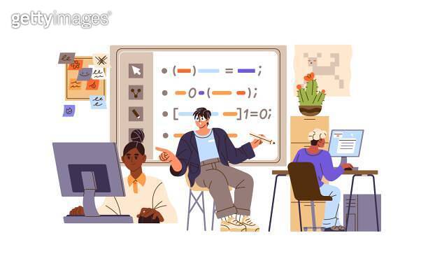 Teacher explains programming to pupils in computer science class ...