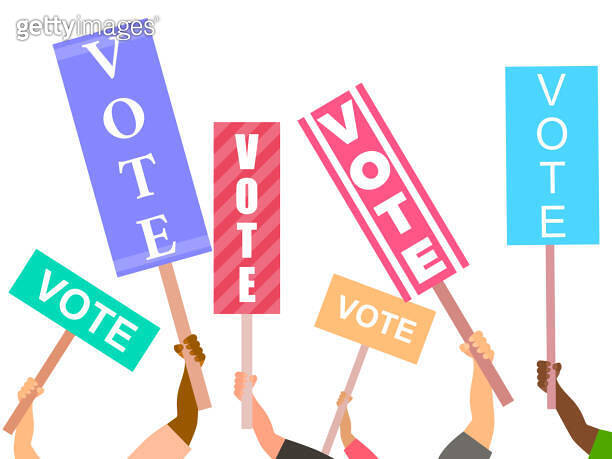 Hands holding placards with the word vote. Election support group ...