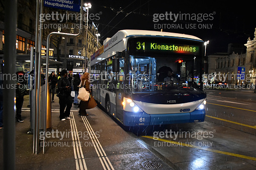 Zurich City Bus Stop In Switzerland, People Waiting For Public ...