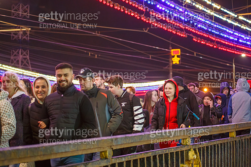 crowd of Russian people crossing the bridge after watching fireworks at ...