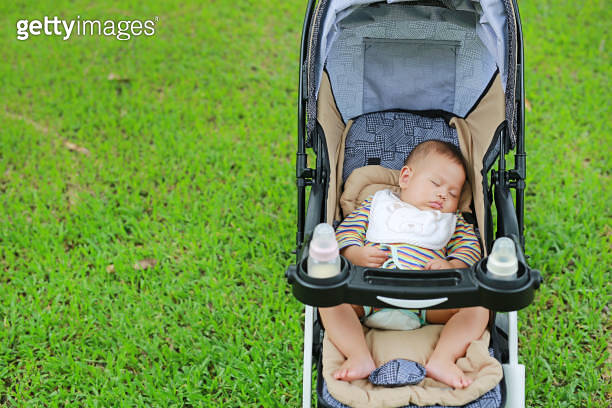 Asian baby boy sleeping in stroller on nature park. 이미지 (2040415151 ...