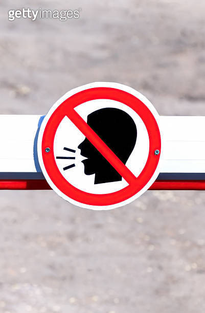 Sound signals are prohibited, Ban honking. Road sign. Do not shout ...