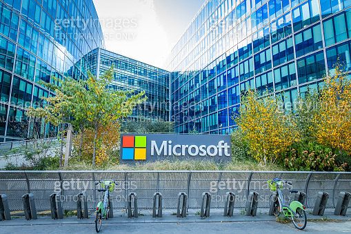 Microsoft sign at the headquarters building in Issy-Les-Moulineaux ...