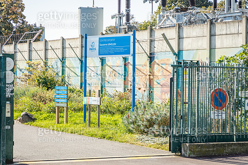 Suzanne Lenglen sports center sign at the entrance of the park ...