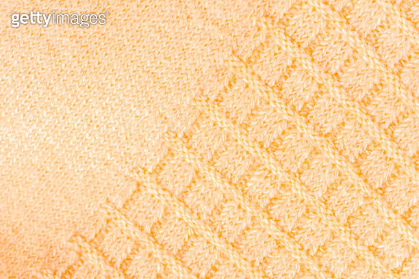 Yellow color knitting pattern from yarn texture. 이미지 (2022336867) - 게티이미지뱅크