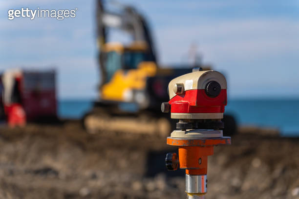 Close-up image of optical level or surveying instrument used to measure ...