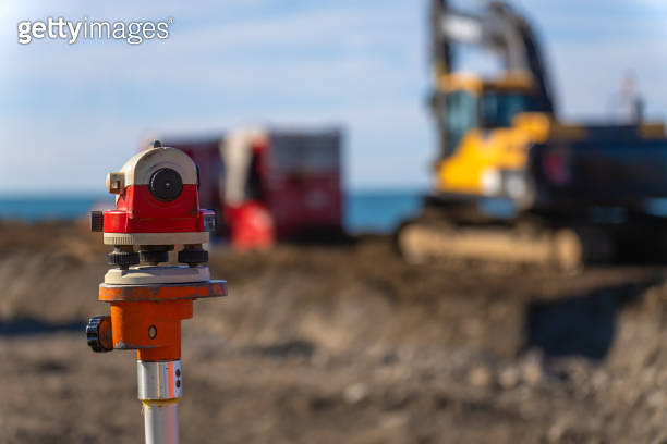 Close-up image of optical level or surveying instrument used to measure ...