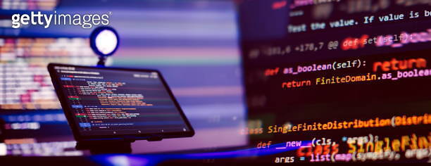 Work from home. Programmer coding code on notebook screen at home. 이미지 (2152686329) - 게티이미지뱅크