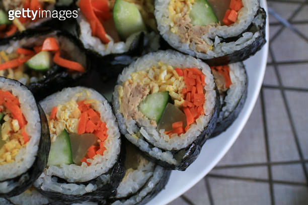Gimbab roll made from steamed white rice and various other ingredients ...