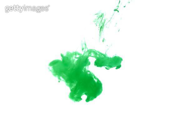 Green color dye melt in water on white background,Abstract smoke ...