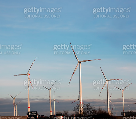 Wind farm park next to a road in Austria in sunny weather (2159486818 ...