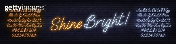 Shine Bright neon text on brick wall background. 이미지 (2150815227) - 게티이미지뱅크