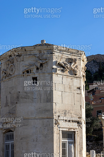 Tower of the Winds, octagonal marble tower in the Roman Agora, Athens ...