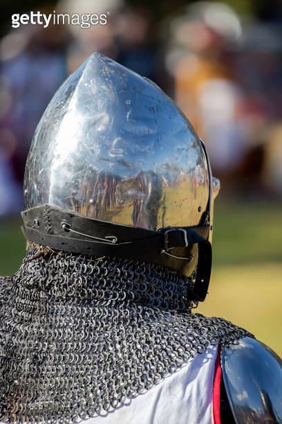 Elements of medieval iron knight armor for battle, helmet, spaulders ...