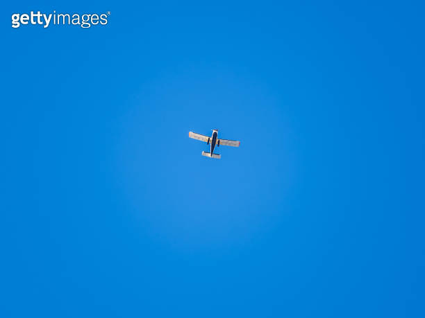 Small ultralight airplane with overhead wing and single propeller ...