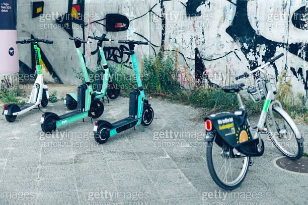 Photo of Berlin, Germany. Sharing e-scooter of Tier, Lime and Bolt ...