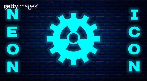 Glowing neon Radioactive icon isolated on brick wall background ...