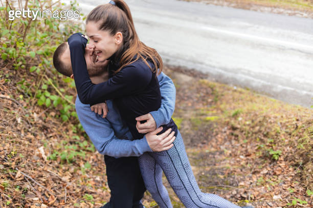 Fitness, spinning and couple hug in park outdoors for exercise ...