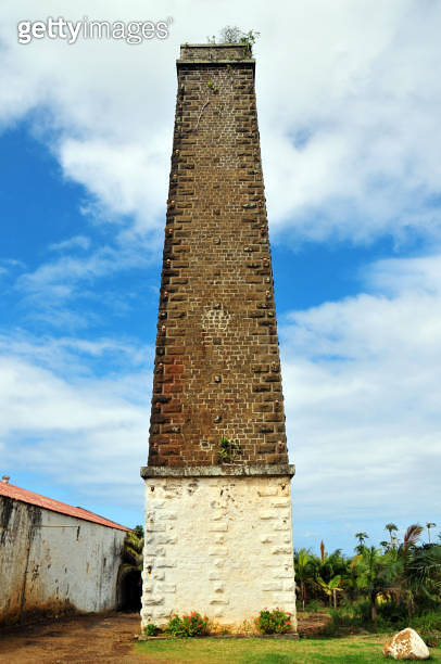 19th century stone masonry tower, an old sugar mill chimney, L'Escalier ...