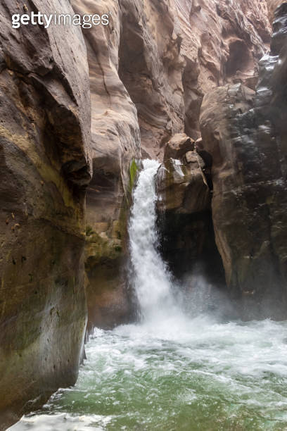 A small waterfall on a tourist route in the Mujib River canyon in Wadi ...