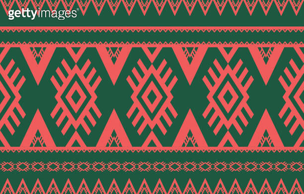 Vibrant red geometric patterns with traditional Aztec motifs on a green ...