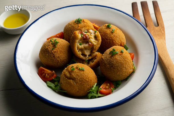 Spanish croquettes made with bechamel sauce and stuffed with octopus ...