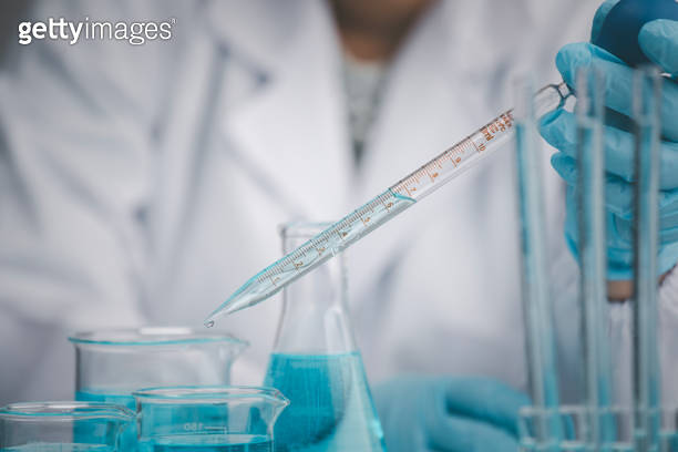 Microscope with lab glassware, nanotechnology conducting research fiber ...