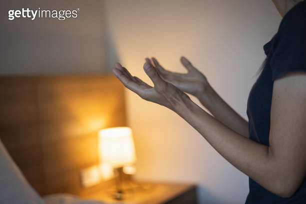 Christian woman praying in bedroom, woman hands praying to god, begging for forgiveness and ...