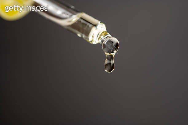 Essential oil, closeup pipette. Skin care. Moisturizing skin care ...