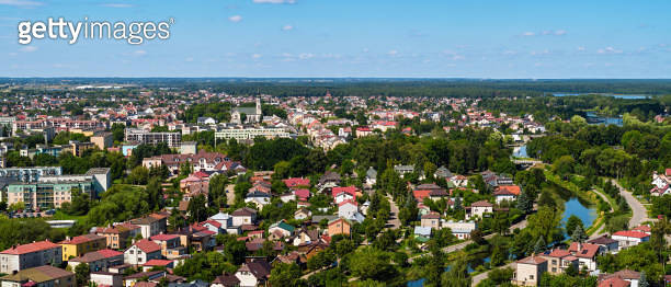 Augustow city by Netta river and Necko lake aerial landscape under blue ...