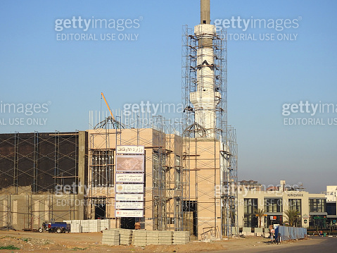 construction site of a new mosque with a steel structure of the dome ...