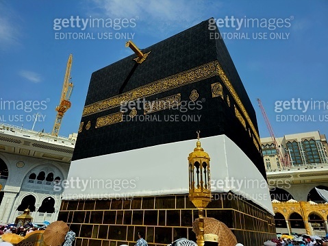 Al Kaaba in Ihram cothing, The Kaaba a stone building at the center of ...